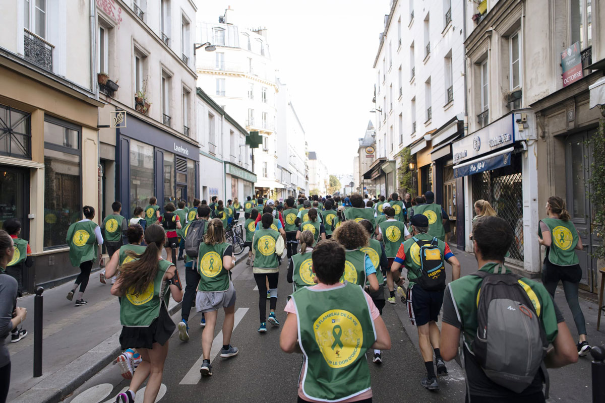 Première édition de la course "Le flambeau de la vie" à Paris - France Rein